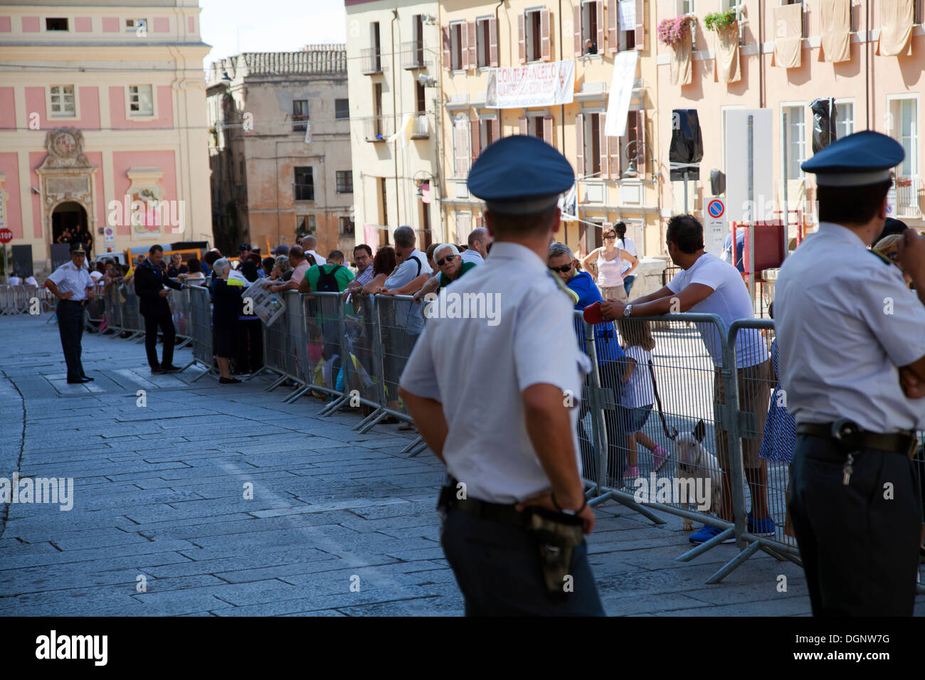 People waiting behind barrier hi-res stock photography and images - Alamy