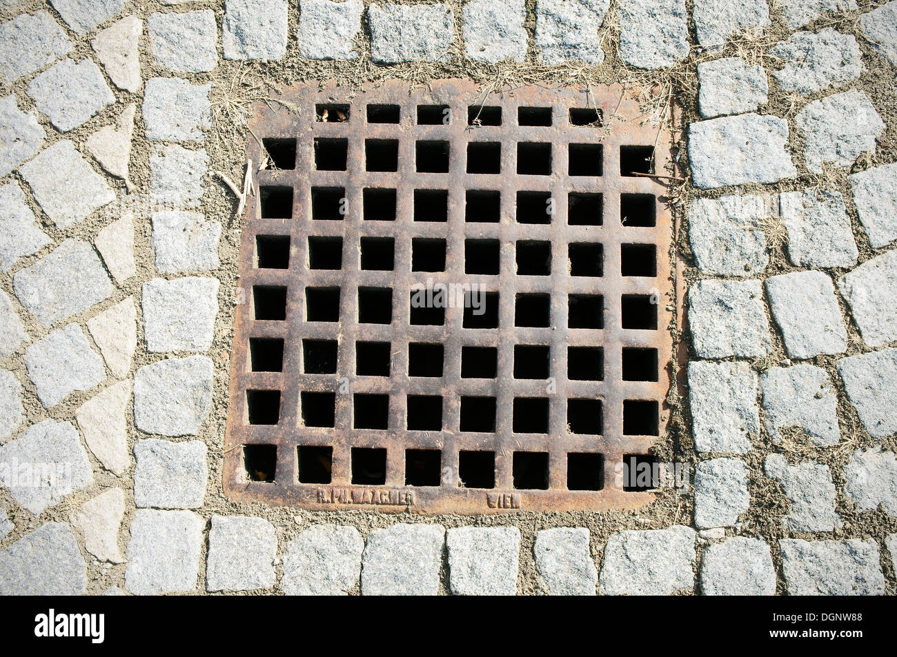 street, cobblestones, sewer lid Stock Photo - Alamy