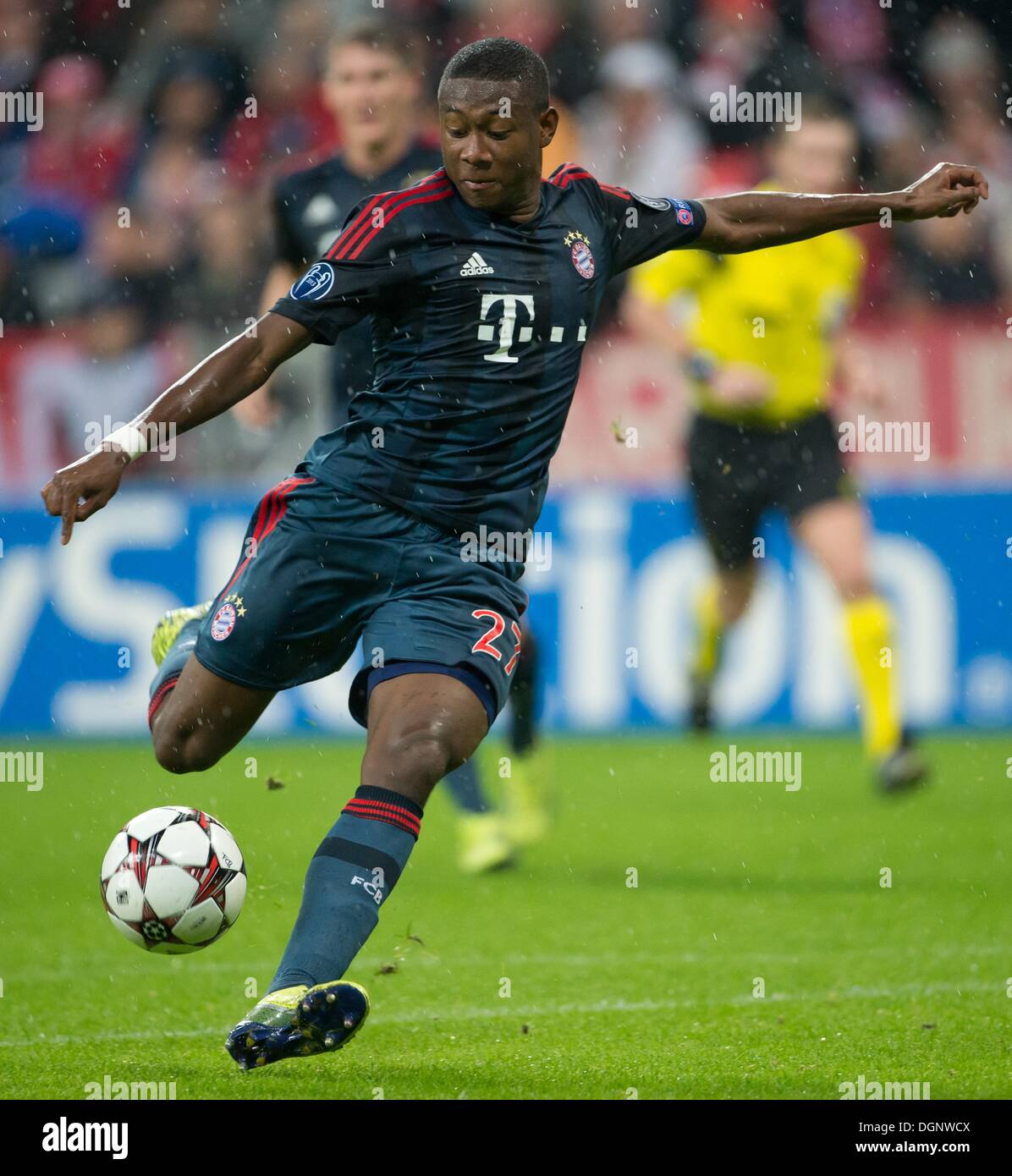 Munich, Germany. 23rd Oct, 2013. Munich's David Alaba scores the 2-0 ...