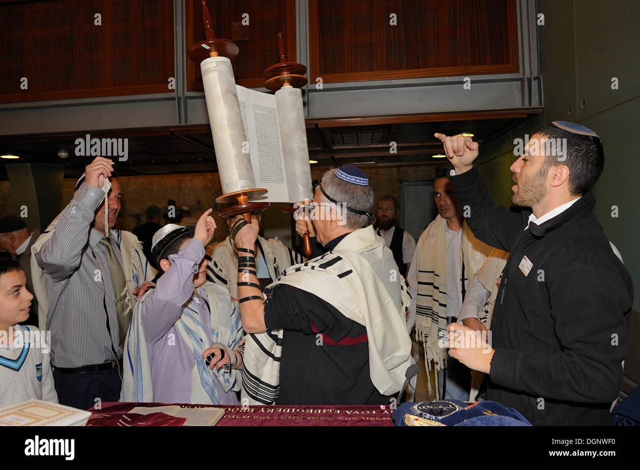 Bar Mitzvah, Jewish coming of age ritual, men holding up Torah scroll ...