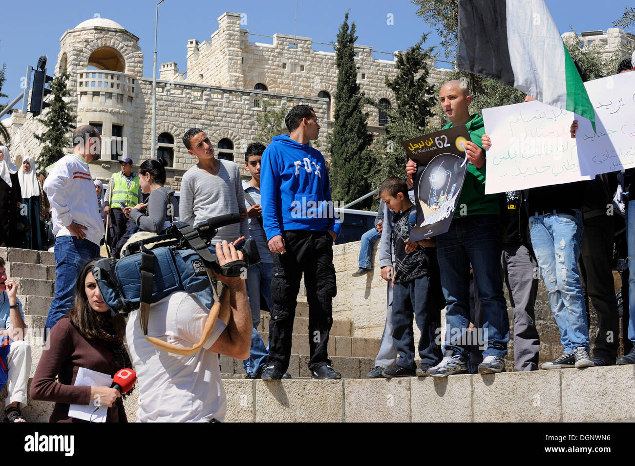 Palestinians demonstrating peacefully with placards and posters against ...