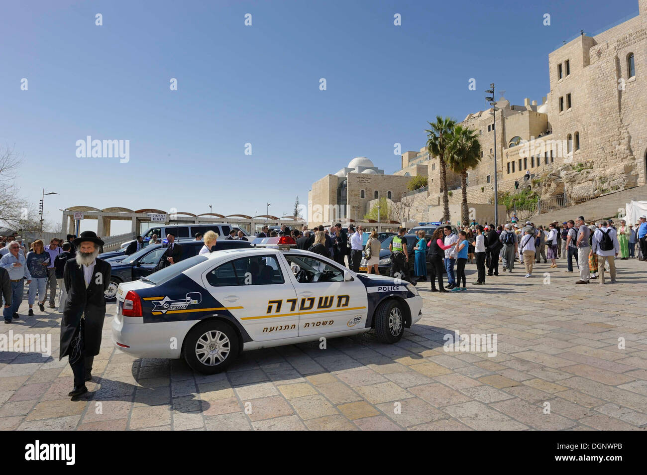 Orthodox Jew, police car and buildings of the Jewish Quarter at the ...