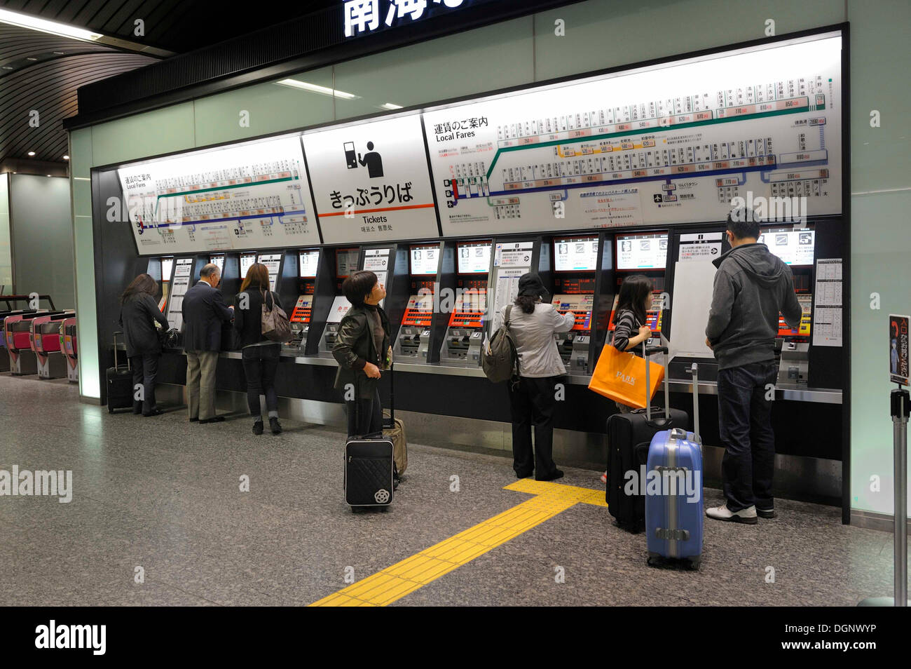 Ticket machines with a plan for the railway station above them with ...