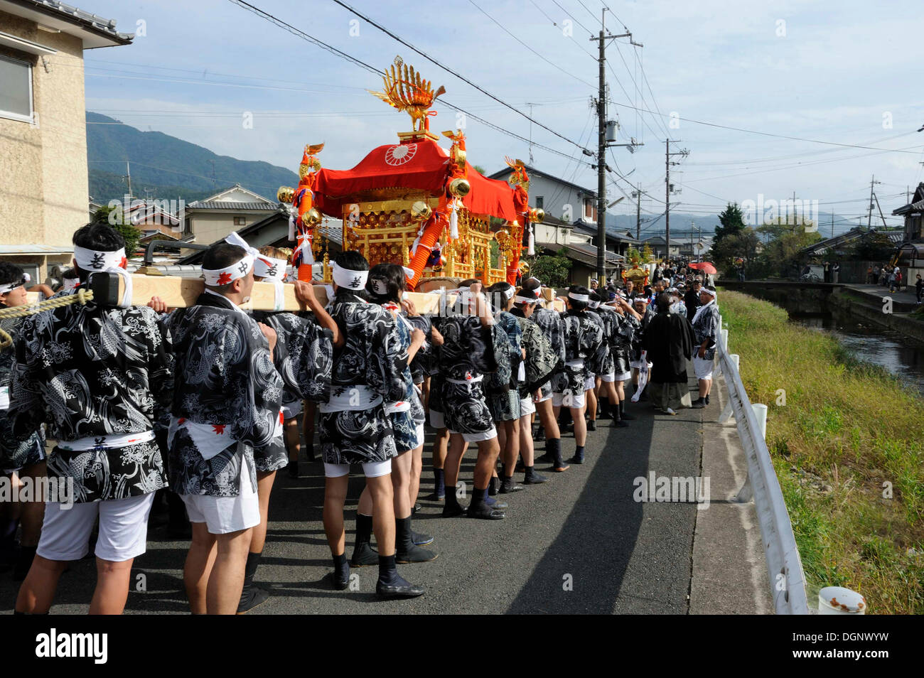 Iwakura Matsuri festival in autumn, worshippers carrying a Shinto ...