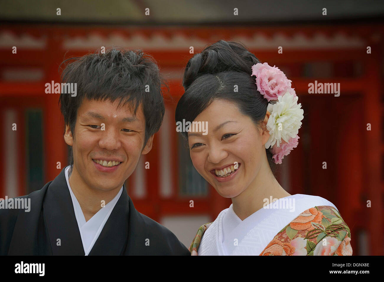 Japanese man and a Japanese woman wearing a kimono for spring with a ...