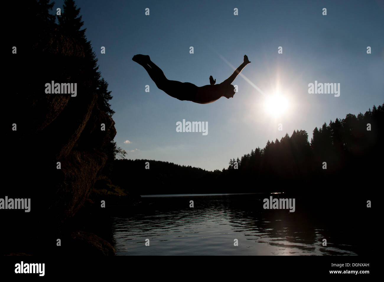 Silhouette man cliff diving hi-res stock photography and images - Alamy