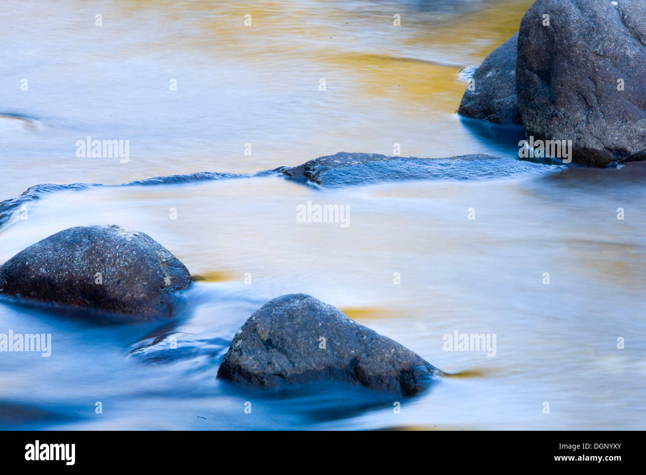 Rocks in a stream Stock Photo - Alamy