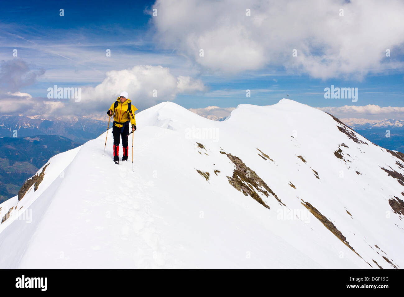 Mountain climber descending from Laugen Mountain above Gampen Pass, in ...