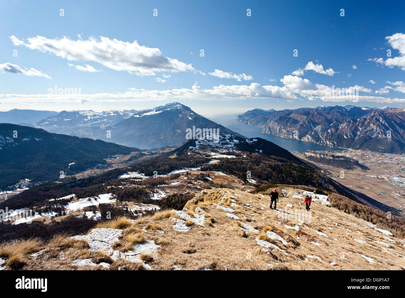 Hikers during the ascent to the peak of Monte Stivo mountain above St ...