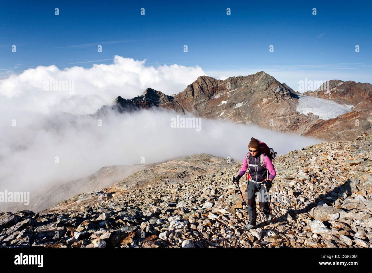 Climber trying to climb Fernerkoefl Mountain in the Rieserferner Group ...