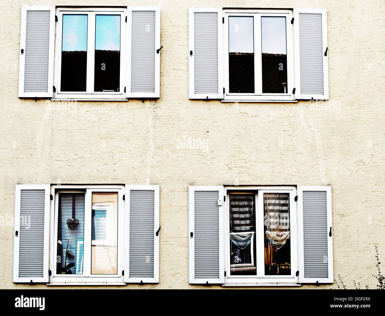 Four windows with shutters Stock Photo - Alamy