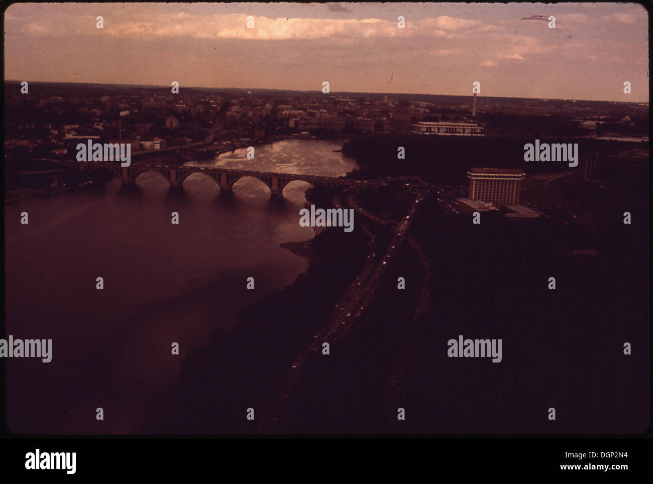 This photograph captures the Potomac River and the Key Bridge, with a southern view of the river ...