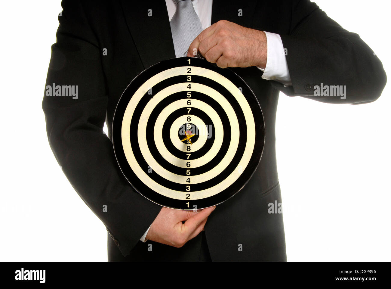Business man holding a target in front of his chest Stock Photo - Alamy