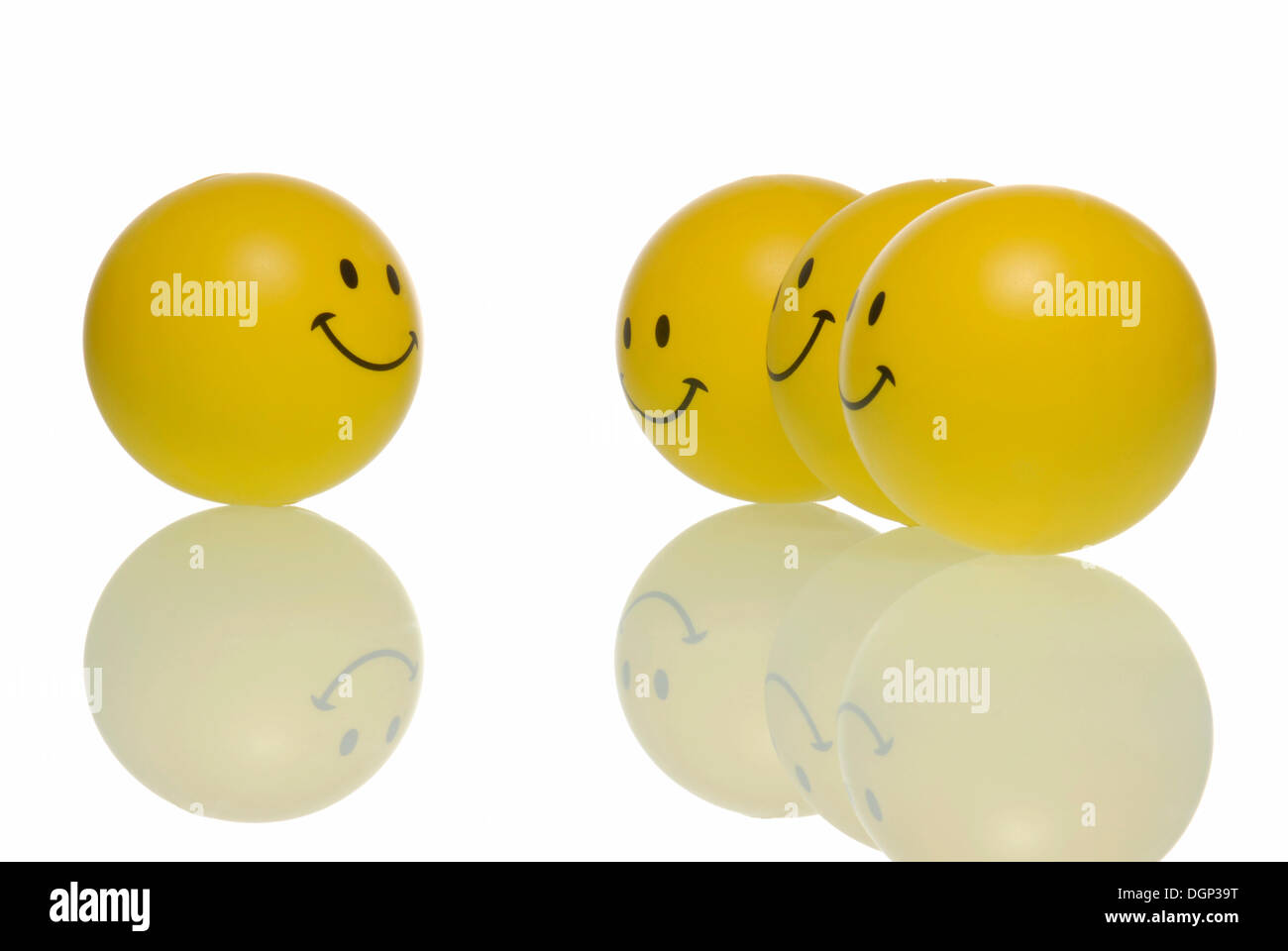 A smiley coaching three other smileys, symbolic image for Coaching ...