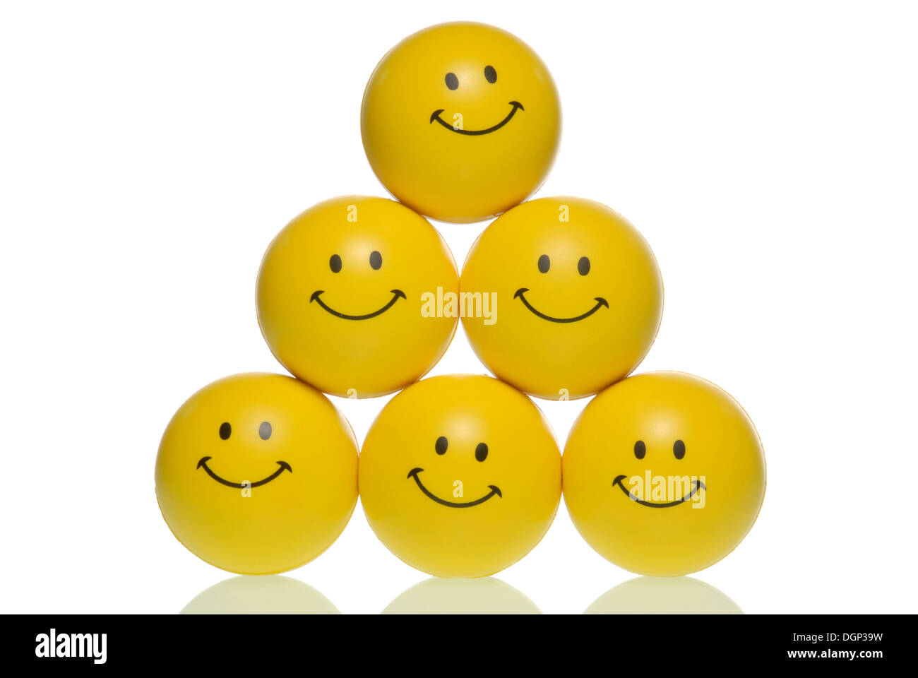 Pyramid of smileys, symbolic image for team Stock Photo - Alamy