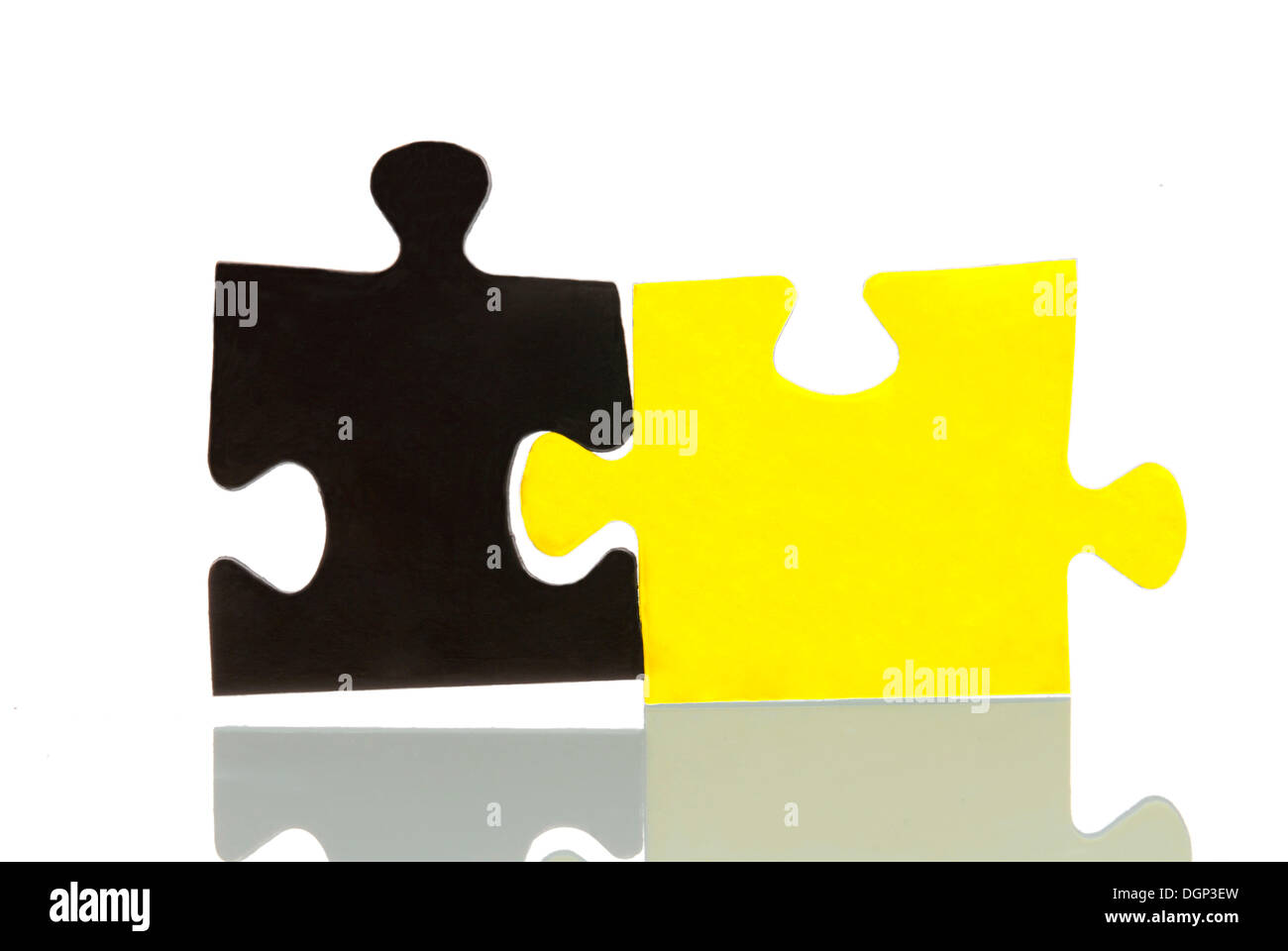 A yellow and a black piece of the puzzle that do not quite fit together ...