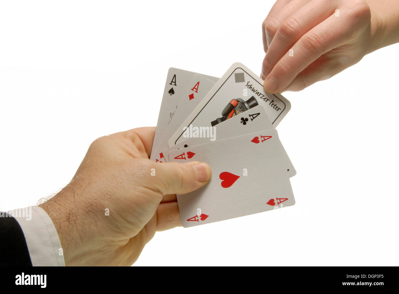 Woman's hand drawing the Black Peter card, symbolic image for bad luck ...