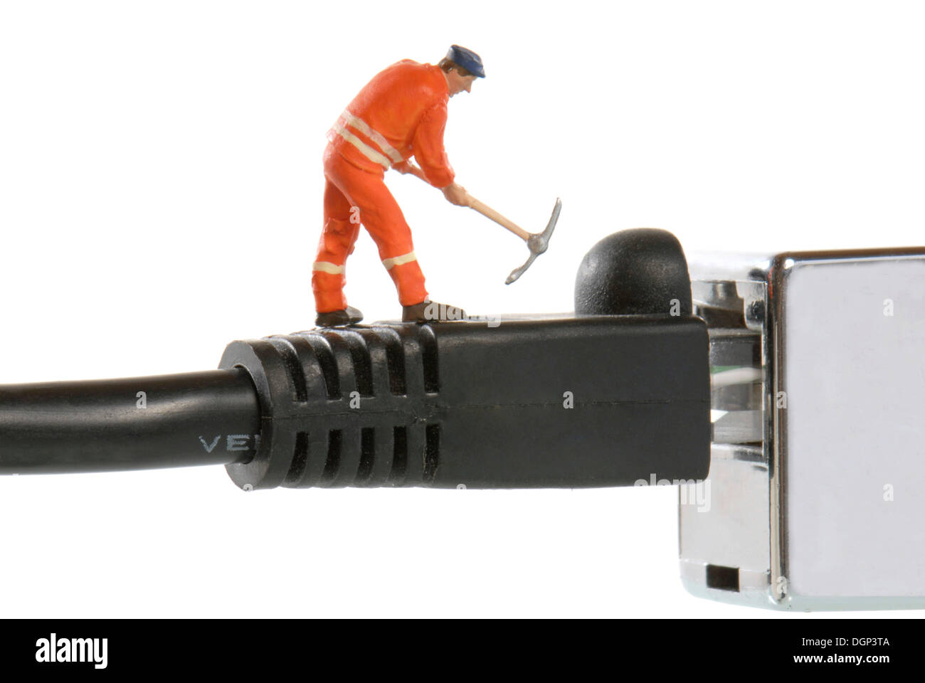 Miniature figure of a construction worker on a LAN cable, symbolic ...