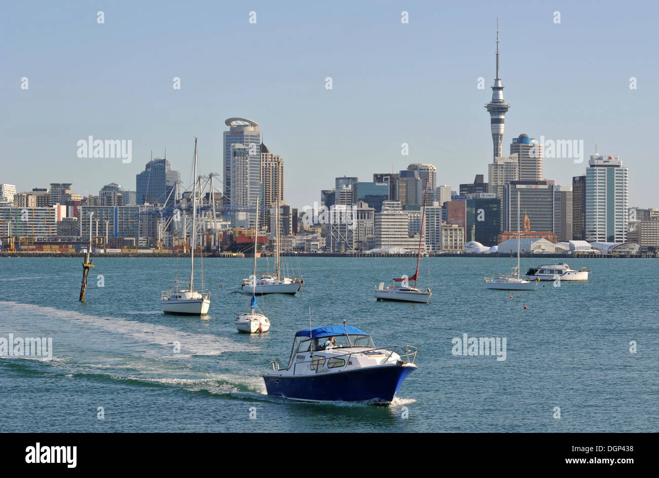 Water taxi in front of the Auckland skyline from Stanley Bay, Auckland ...