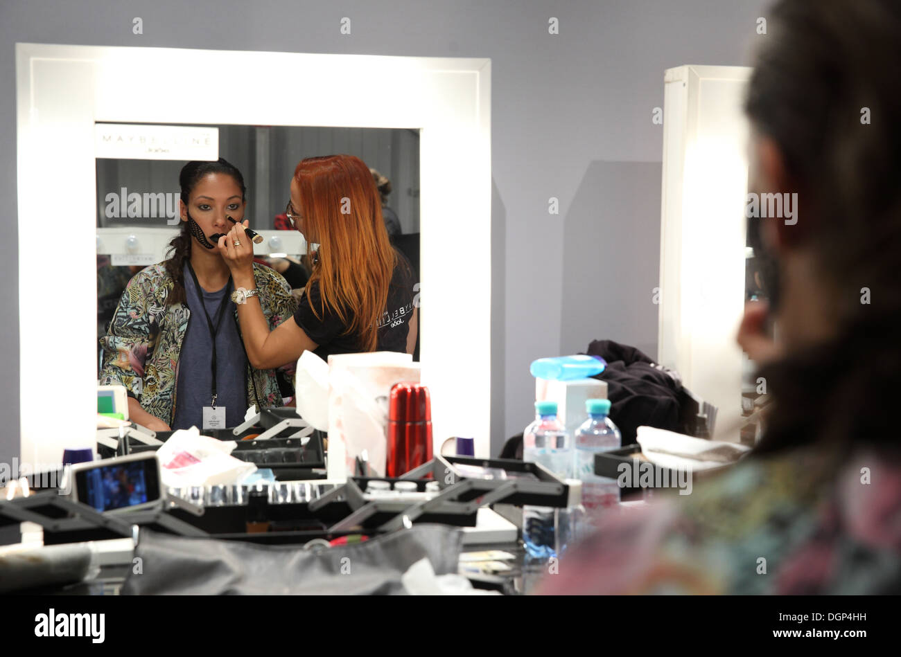 Berlin, Germany, makeup is applied in the models at Fashion Week Stock ...