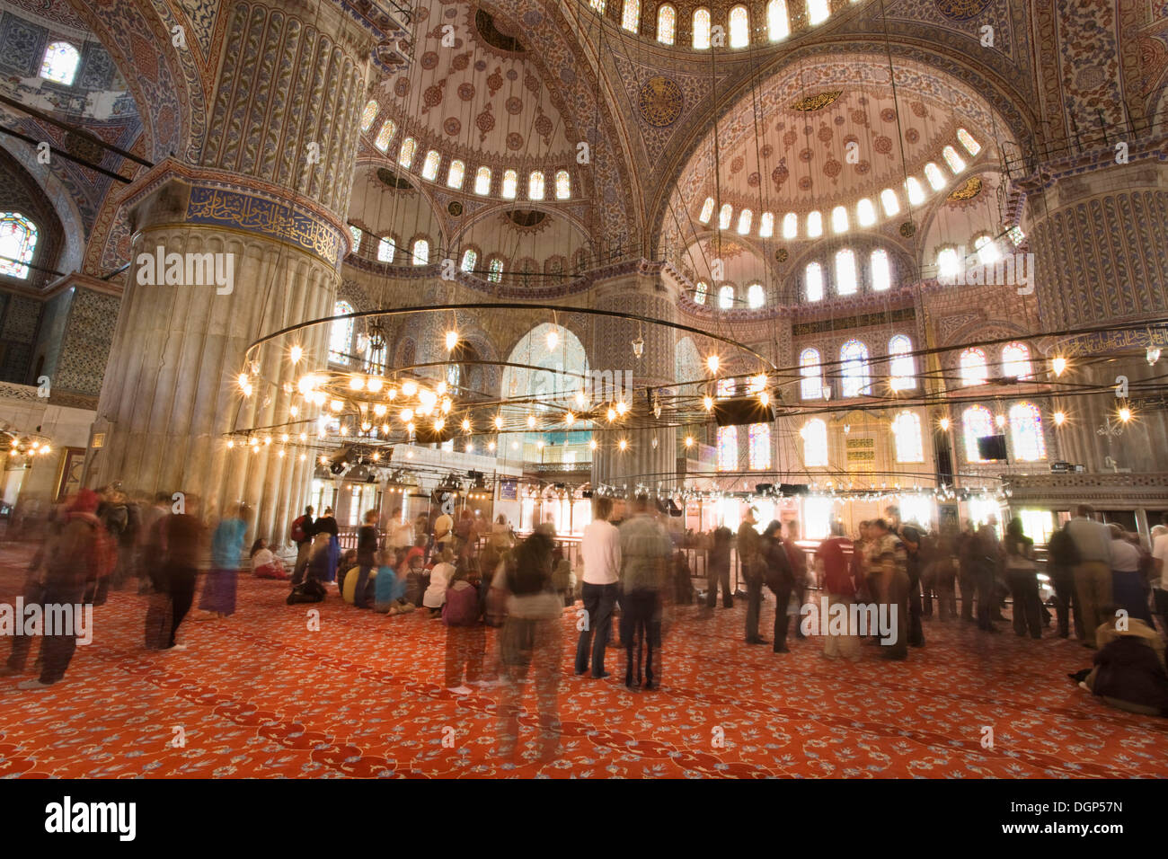 Tourists inside the Blue Mosque, Sultan Ahmet Mosque, Istanbul, Turkey ...
