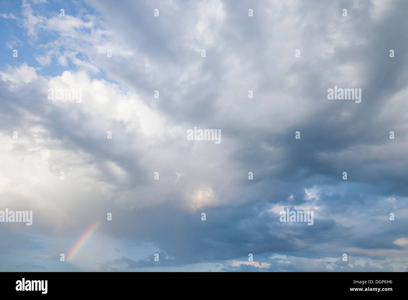 England, Cloudy Weather and Rainbow Stock Photo - Alamy