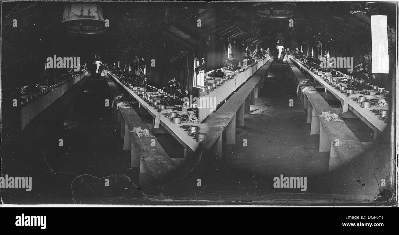 This photograph shows a soldiers' dining hall, possibly from a military ...