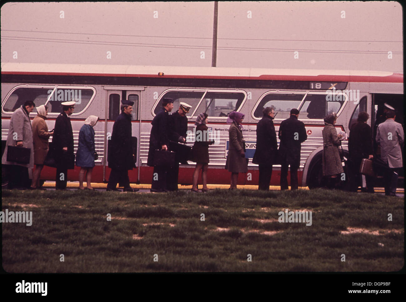 Passengers wait in line at a Park and Ride station in Springfield ...