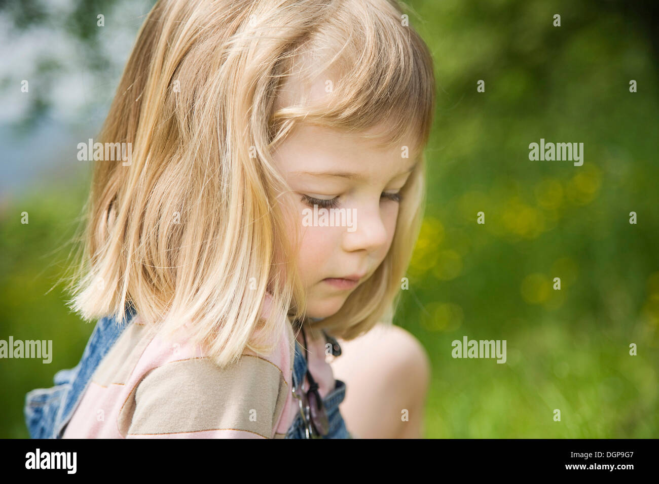 Girl deep in thought, portrait Stock Photo - Alamy