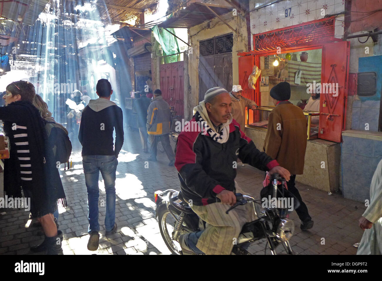 Morocco - Marrakesh Street scene in bazaar with dramatic lighting Stock ...