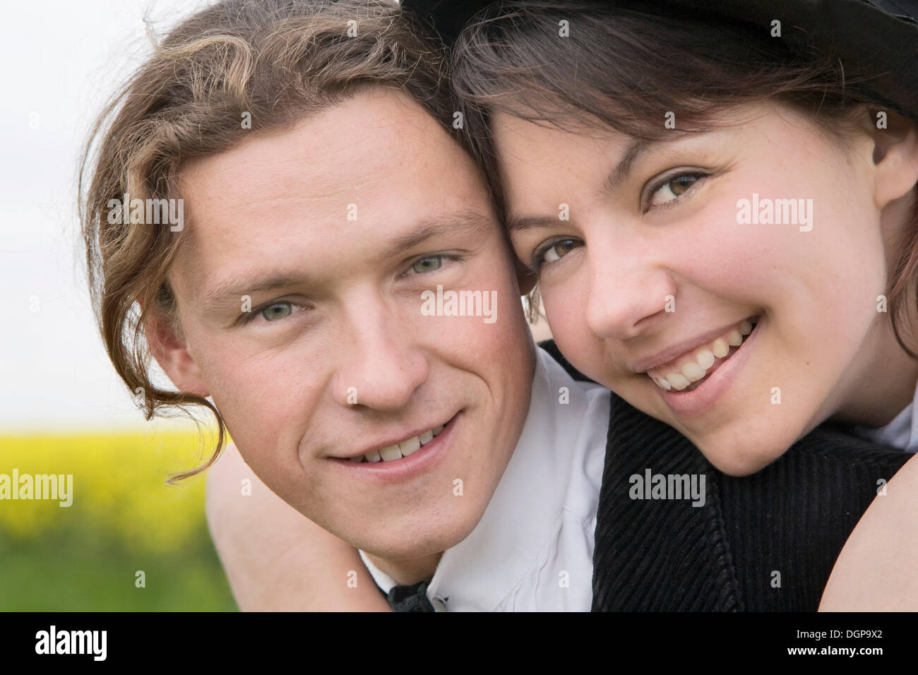 Young woman embracing her partner Stock Photo - Alamy