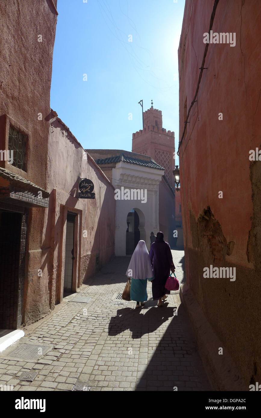 Morocco - Marrakesh Women walking in back street Stock Photo - Alamy