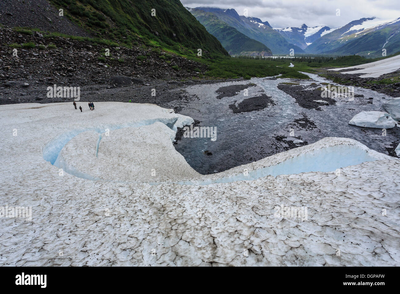 Toe of a glacier and the river mouth in mountains in Alaska in summer ...