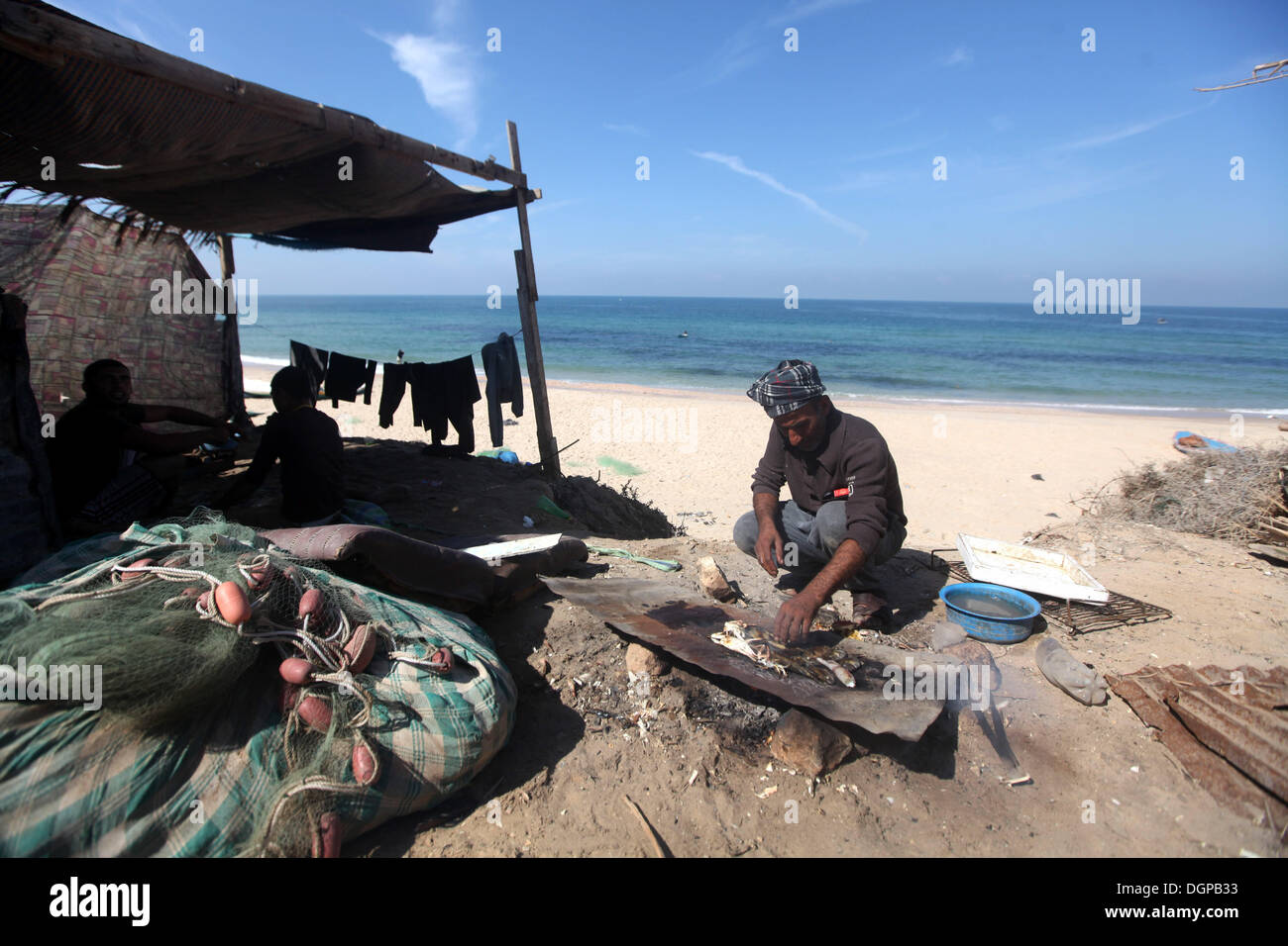 Palestinian fisherman fish hi-res stock photography and images - Alamy