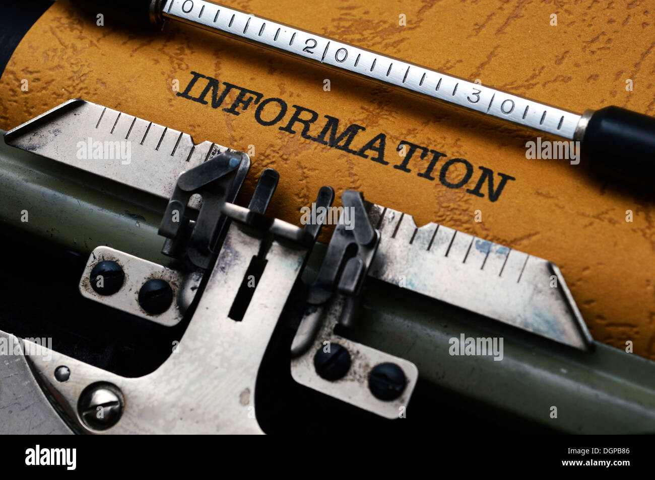 Information text on typewriter Stock Photo - Alamy
