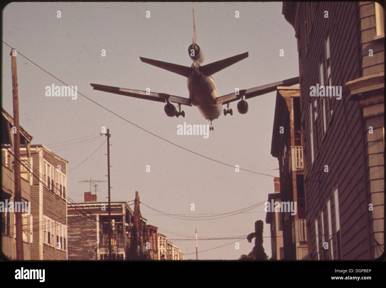 This photograph captures an airplane approaching Logan Airport for a ...