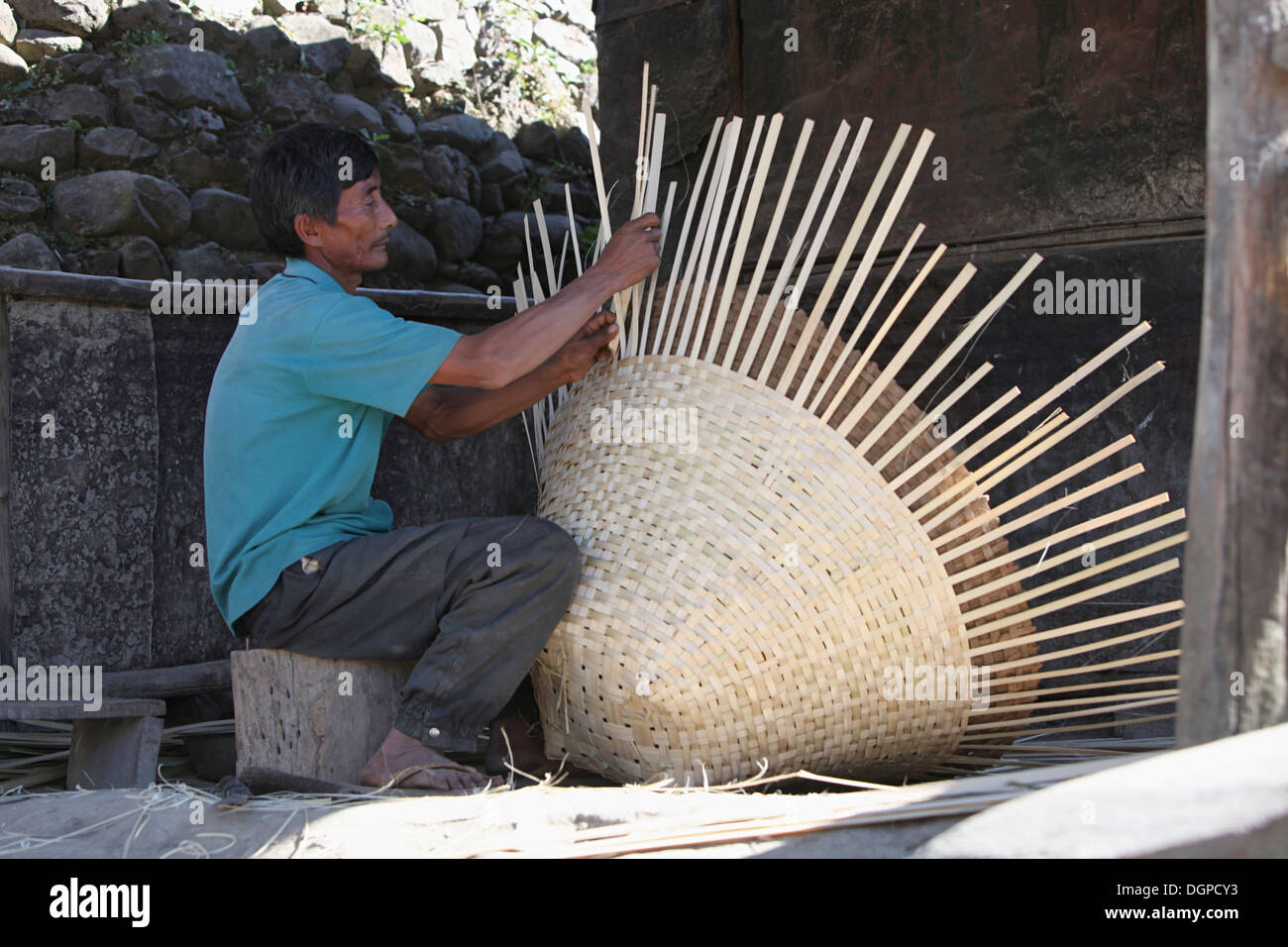 Tribal man making grain baskets, Mimo village, Nagaland, India Stock ...