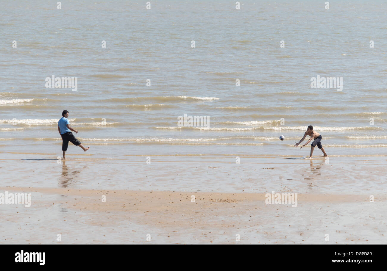 Father and son playing on beach ocean hi-res stock photography and ...