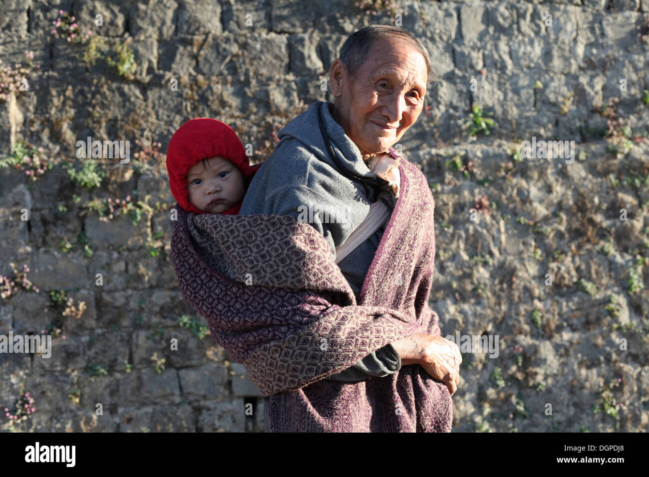 Grandfather with his grandson, Mimo village, Nagaland, India Stock ...