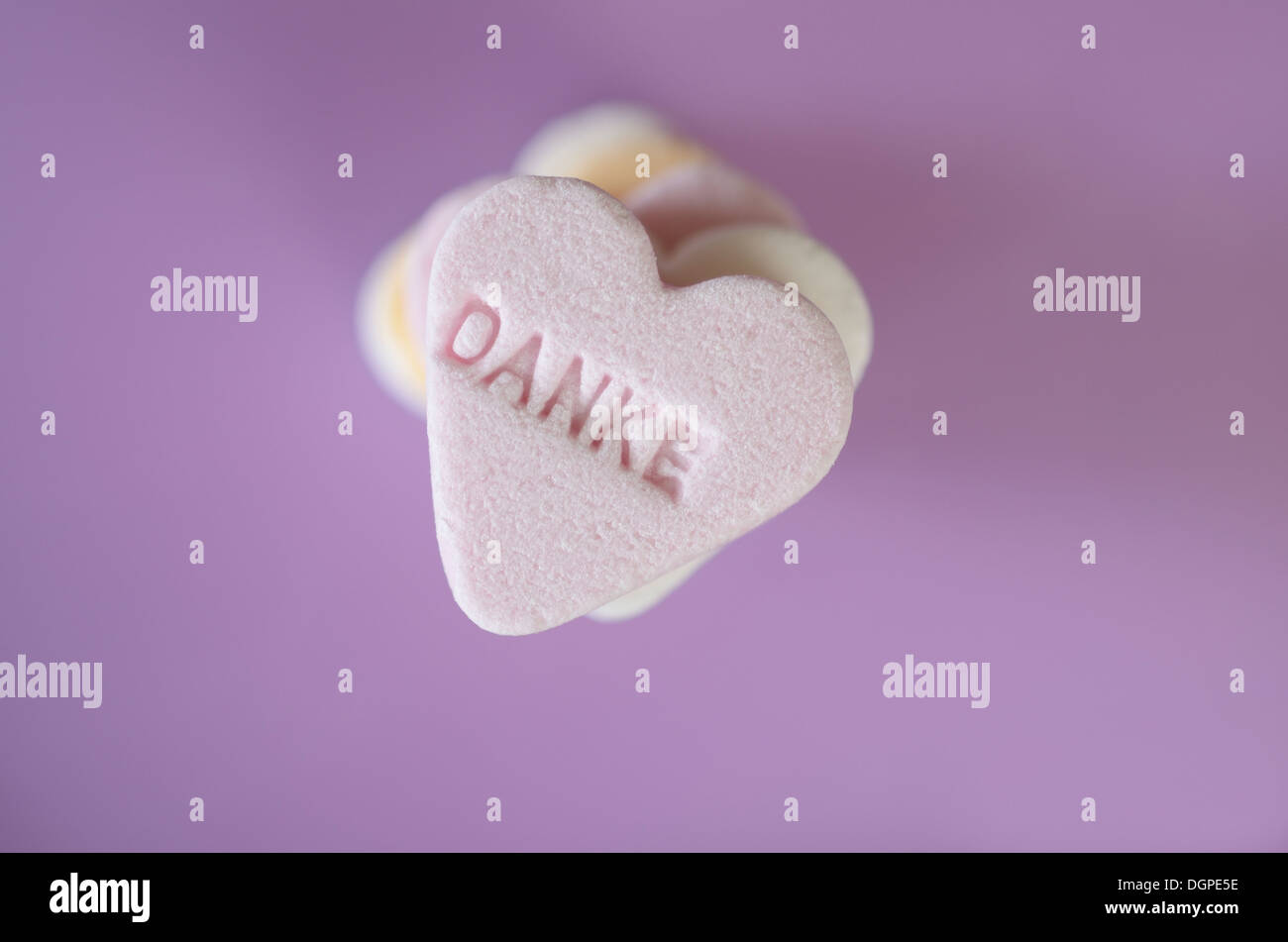 Heart shaped candy with " Danke Stock Photo - Alamy