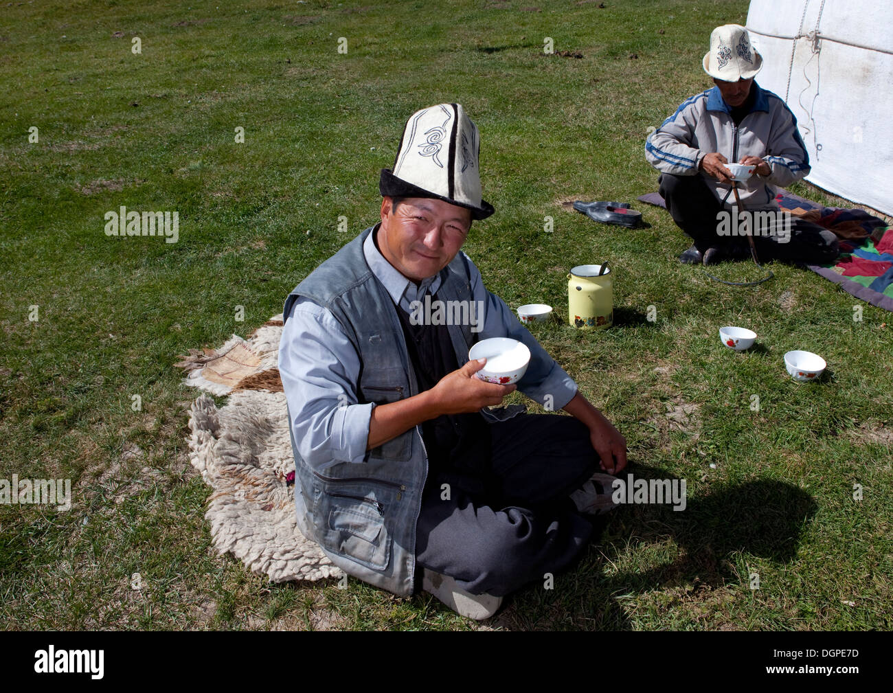 Men With Kalpak Hats Drinking Milk In Front Of A Yurt, Song Kol Lake ...