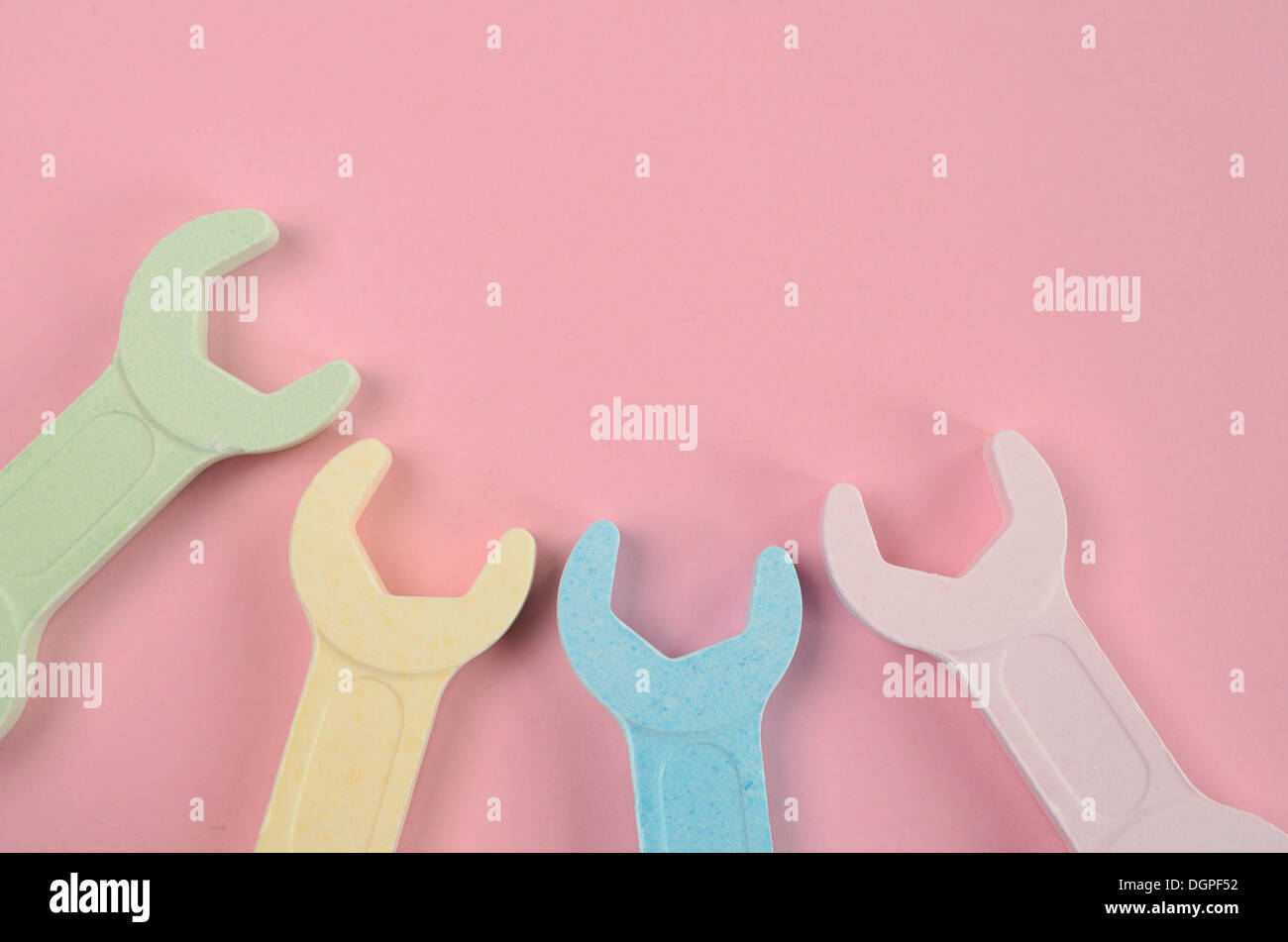 Colorful wrench on a pink background with space for text Stock Photo ...