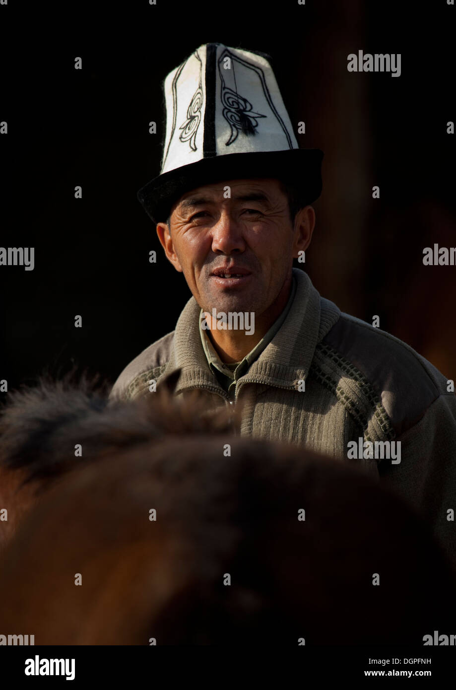 Man With A Kalpak Hat At The Animal Market Of Kochkor, Kyrgyzstan Stock ...