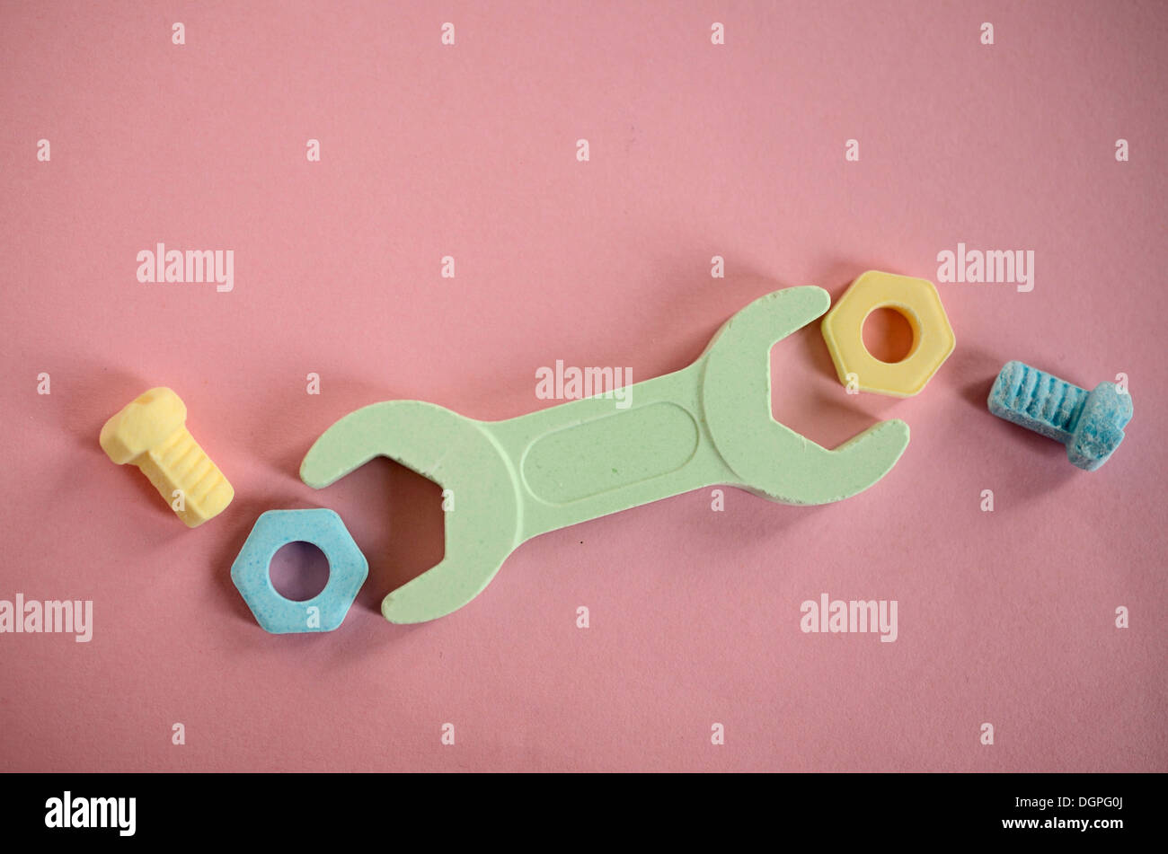 Sweet tools on a pink background Stock Photo - Alamy