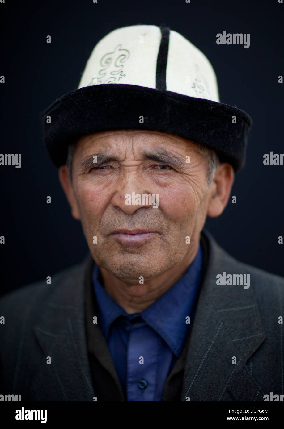 Old Man Wearing A Kalpak Hat At The Animal Market Of Kochkor ...