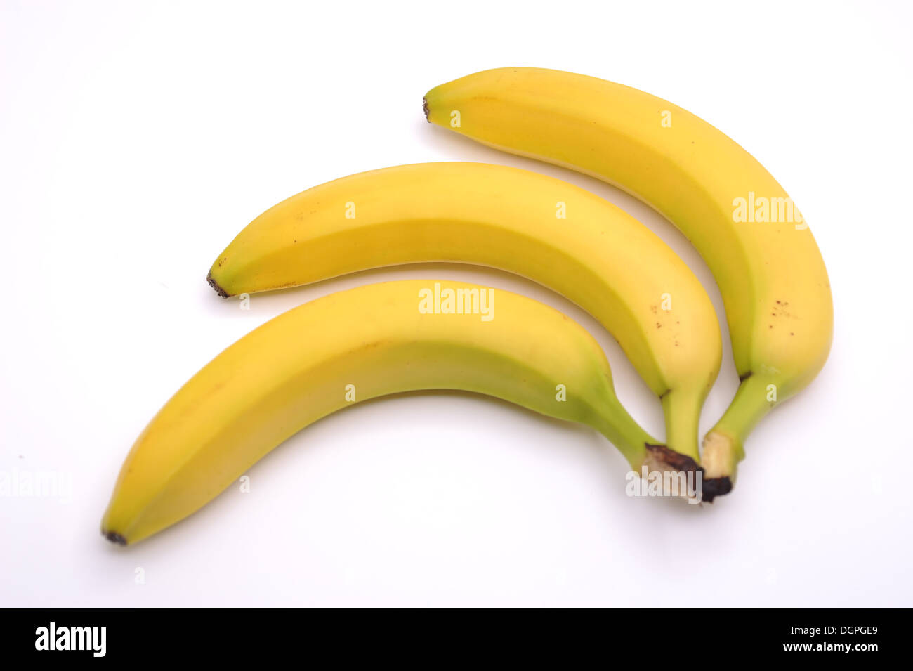 three bananas on white background Stock Photo - Alamy