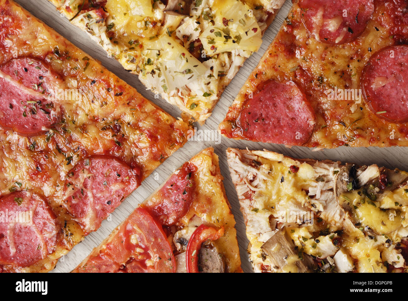 Five different slices of pizza Stock Photo - Alamy