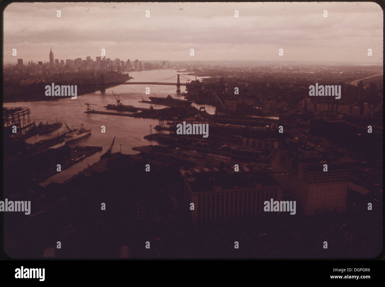 This photograph offers a view looking north towards Lower Manhattan, with Brooklyn in the ...