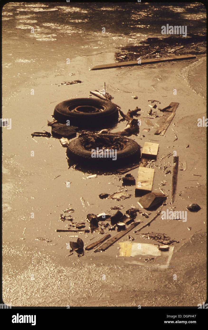 This image shows trash floating in the Baltimore Harbor near Pier 8 ...