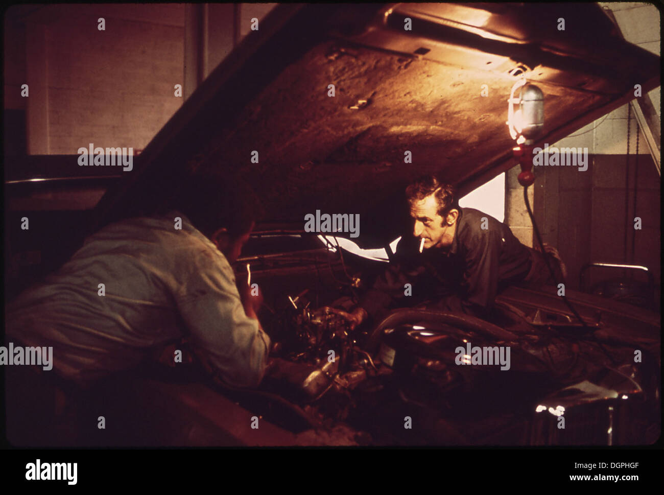 Mechanics work at the Call Carl computerized center, highlighting the ...